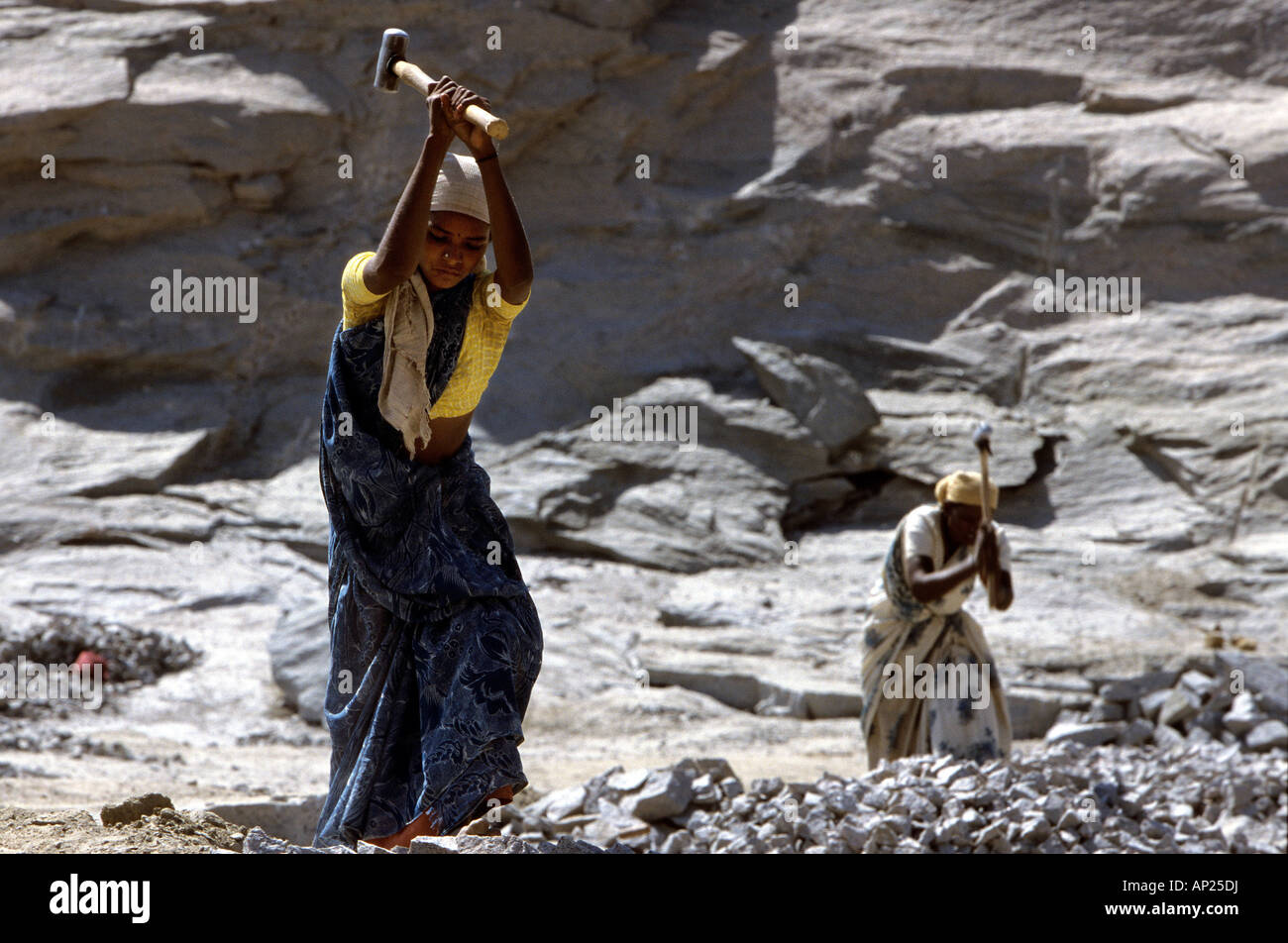 India: women from the cast of the untouchables working in a quarry near ...