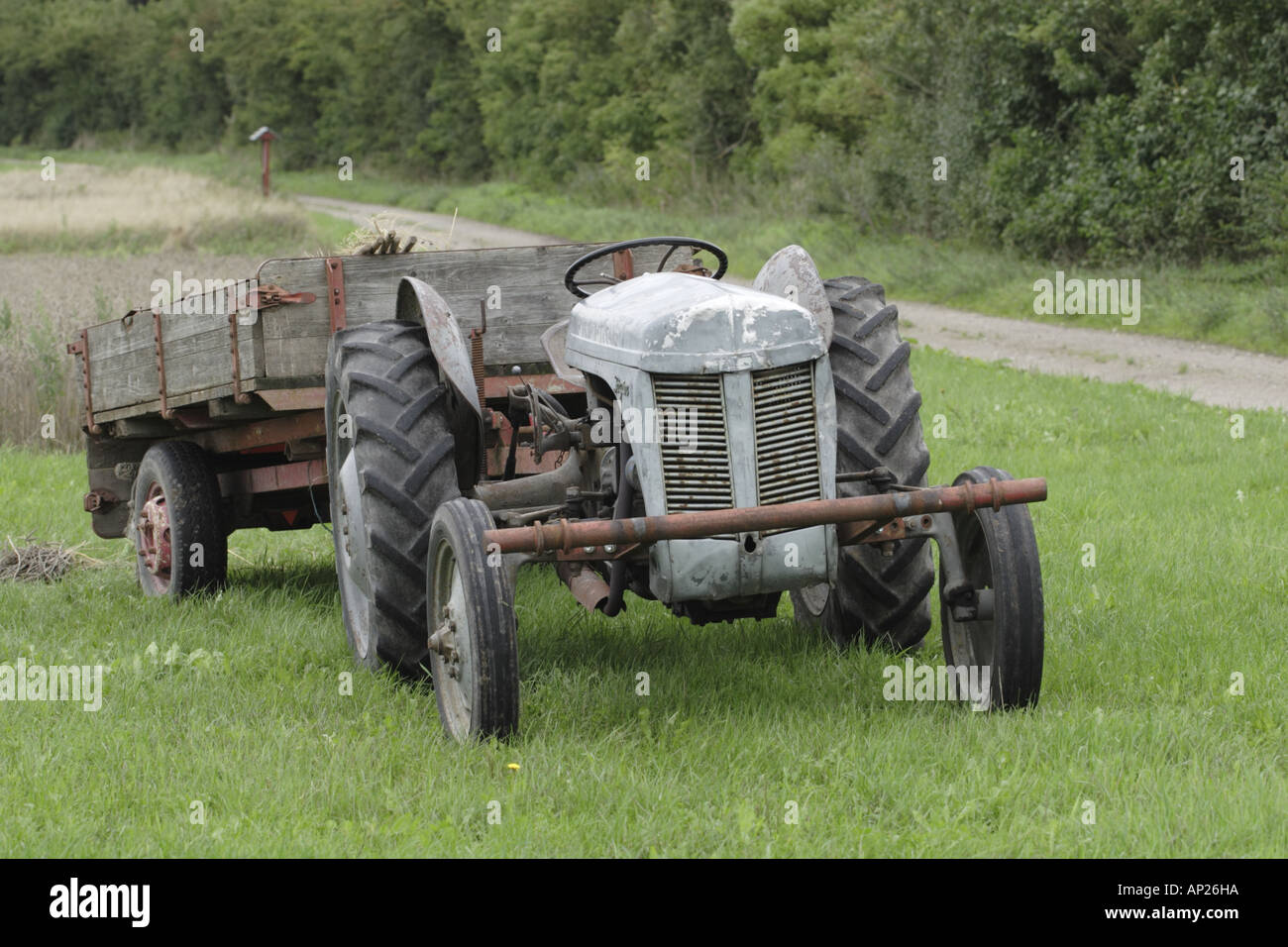 Old fashioned tractor and cart in a field in Denmark Stock Photo - Alamy