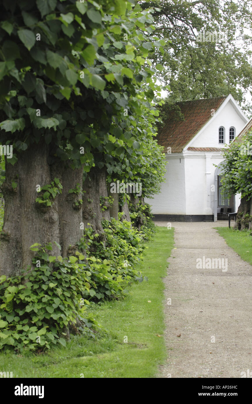 Tree lined path at the Danish Agricultural Museum in Gammel Estrup near ...