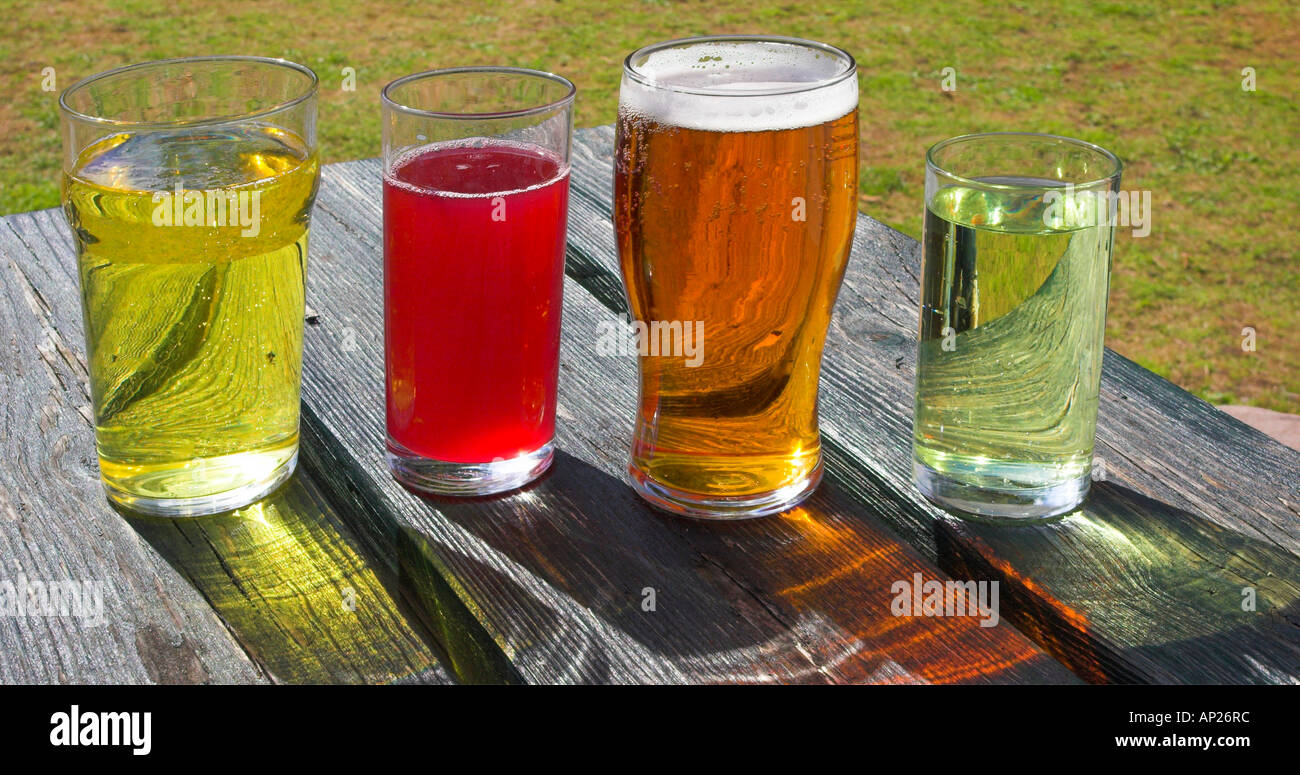 Round of drinks outside in the garden Stock Photo - Alamy