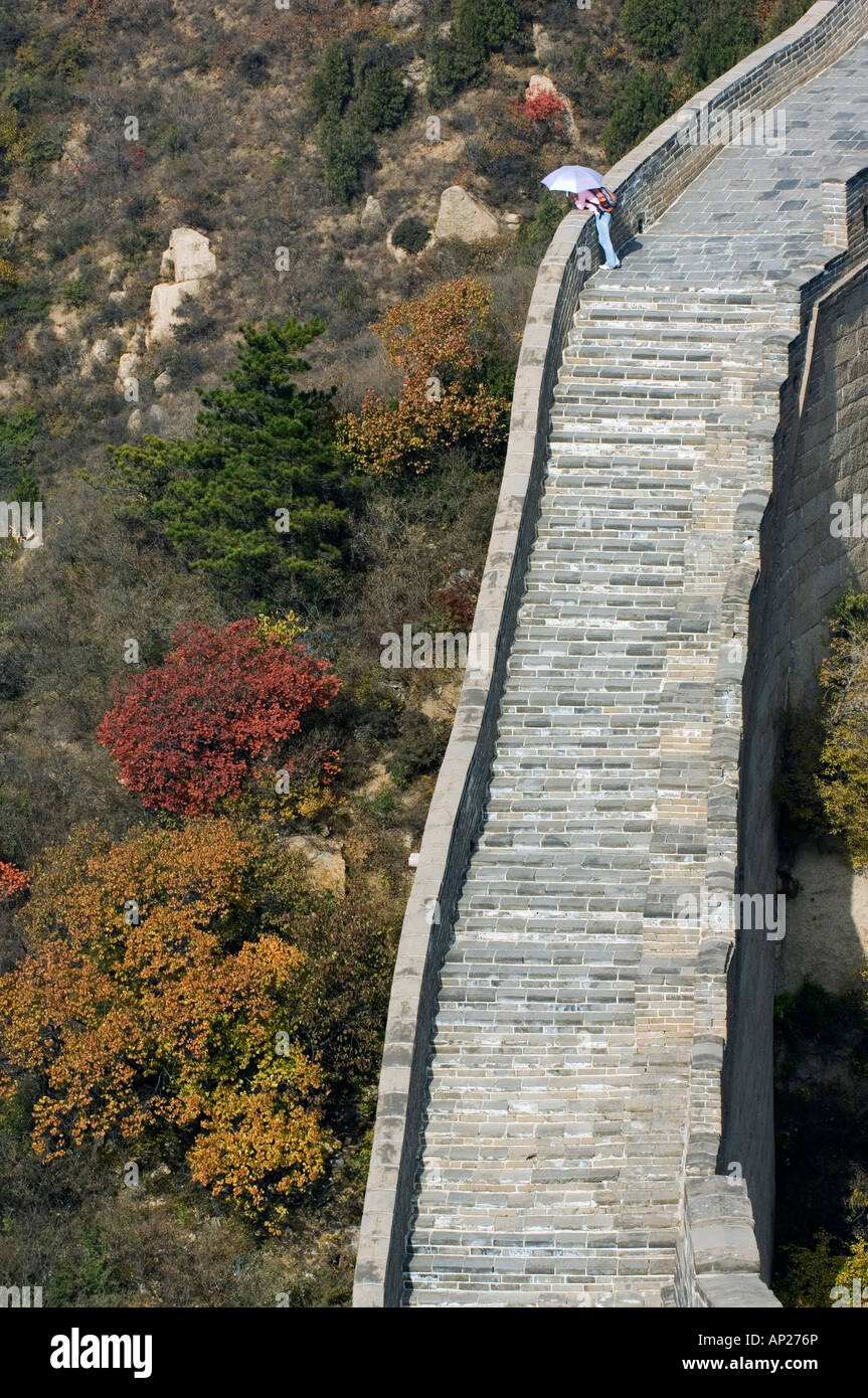 autumn colours and a girl with a parasol on The Great Wall of China at ...