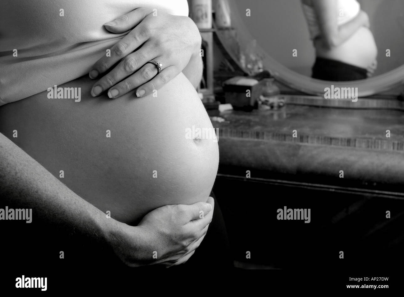 Pregnant belly in a mirror Black and White Stock Photos & Images - Alamy