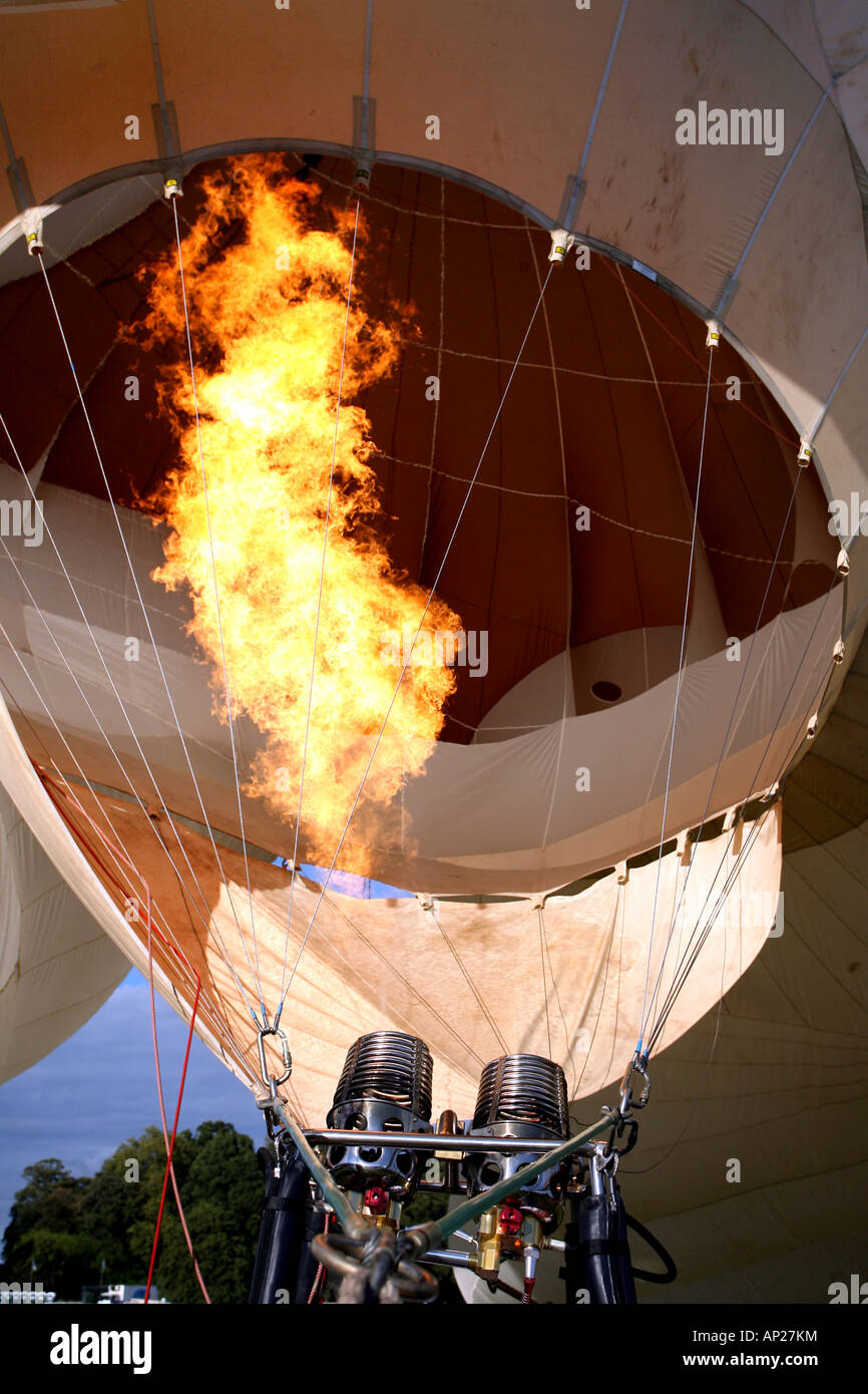 A Hot Air Balloon with gas being burned Stock Photo - Alamy