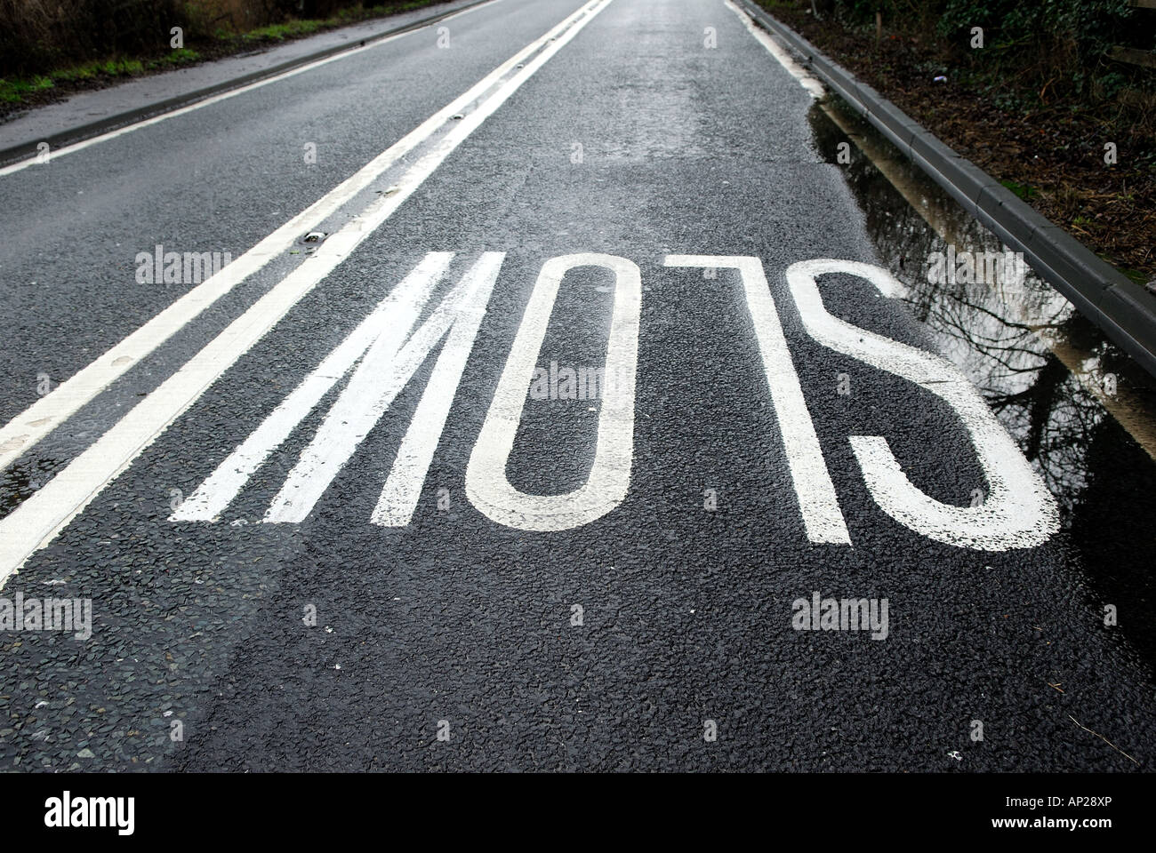 Road marking slow sign painted hi-res stock photography and images - Alamy