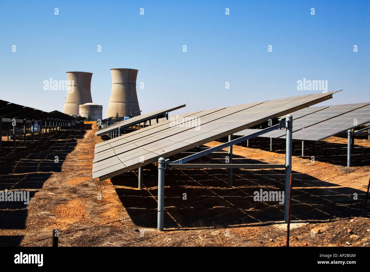 Solar panel array and cooling towers at decommissioned nuclear power ...