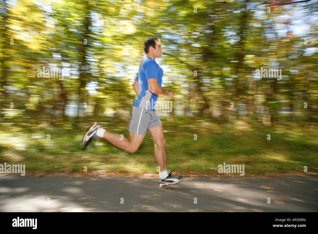 Man 40-45 years old, cross country running blurred motion, MR-10-04-07 ...