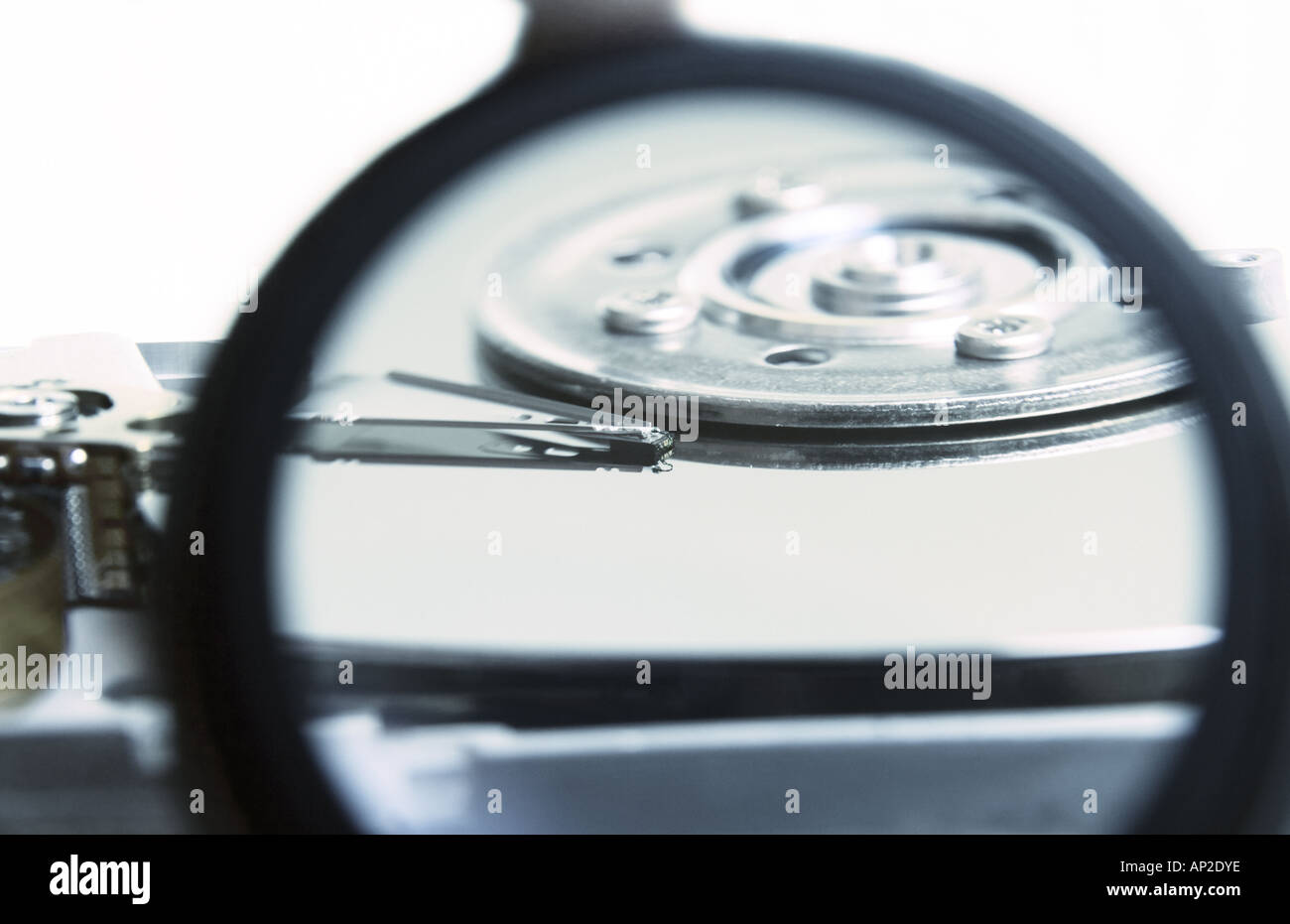 Hard drive viewed through magnifying lens Stock Photo - Alamy