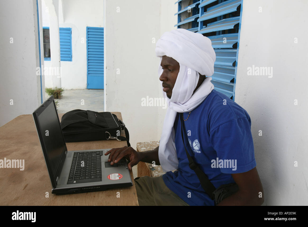 Man behind laptop Stock Photo - Alamy
