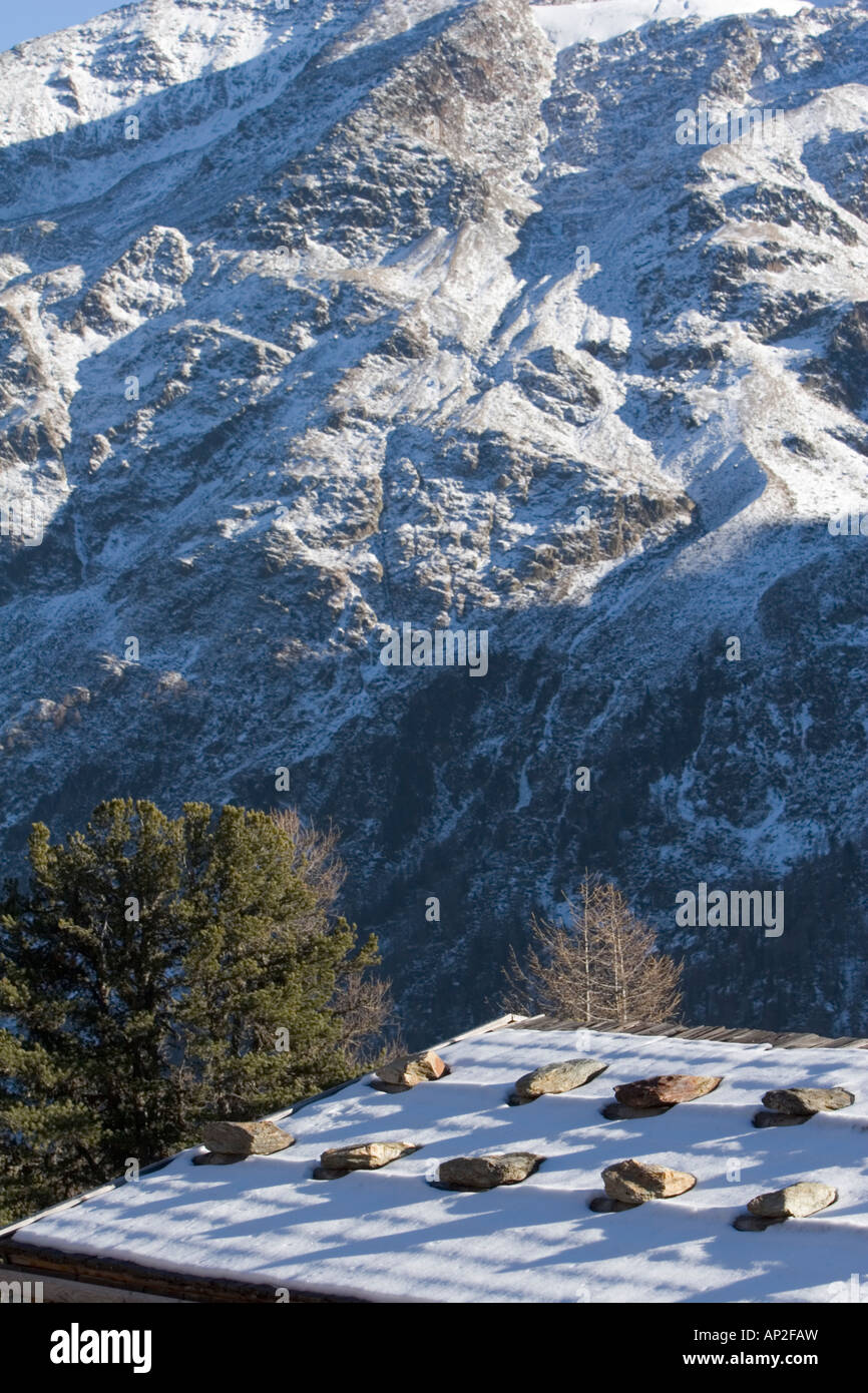 Traditional mountain hut roof with stones. in Allto Adige, Italy Stock ...