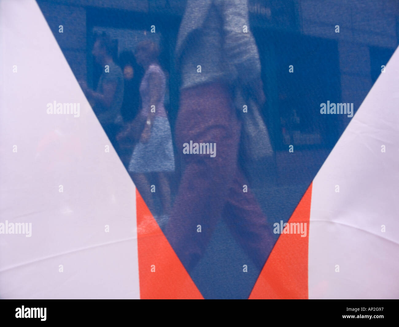 Flag on streets of New York City with pedestrians behind Stock Photo ...