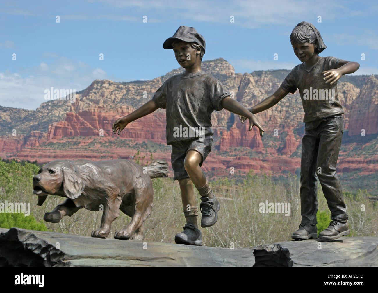 Bronze statue of children in Sedona Arizona Stock Photo - Alamy