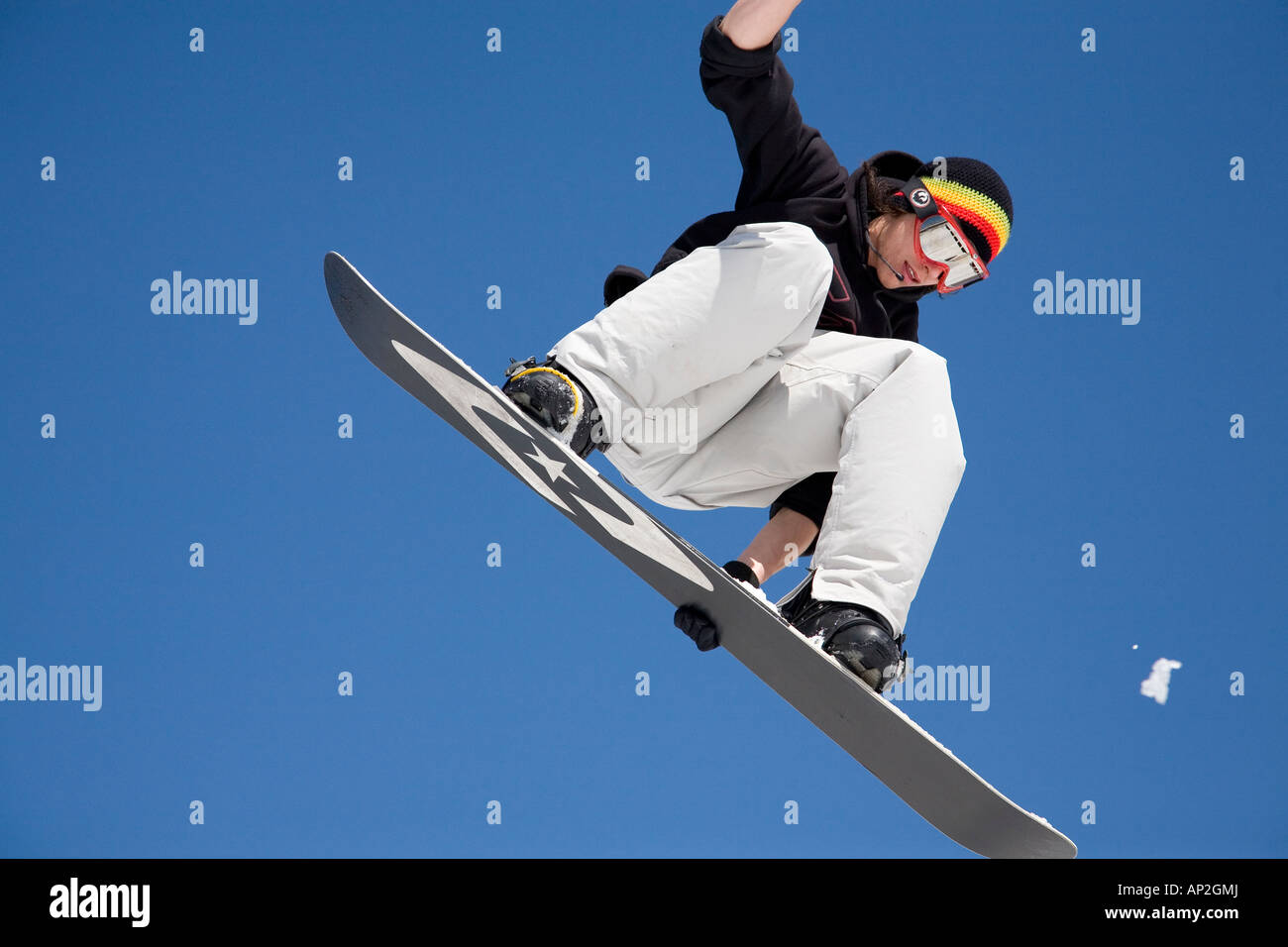 Snowboard jumping on Vogel mountain Bohinj Triglav National Park ...