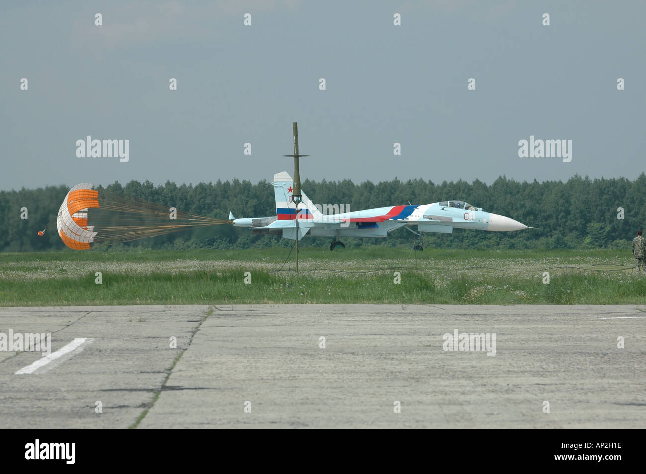 Fighter SU 27 on a runway Stock Photo - Alamy