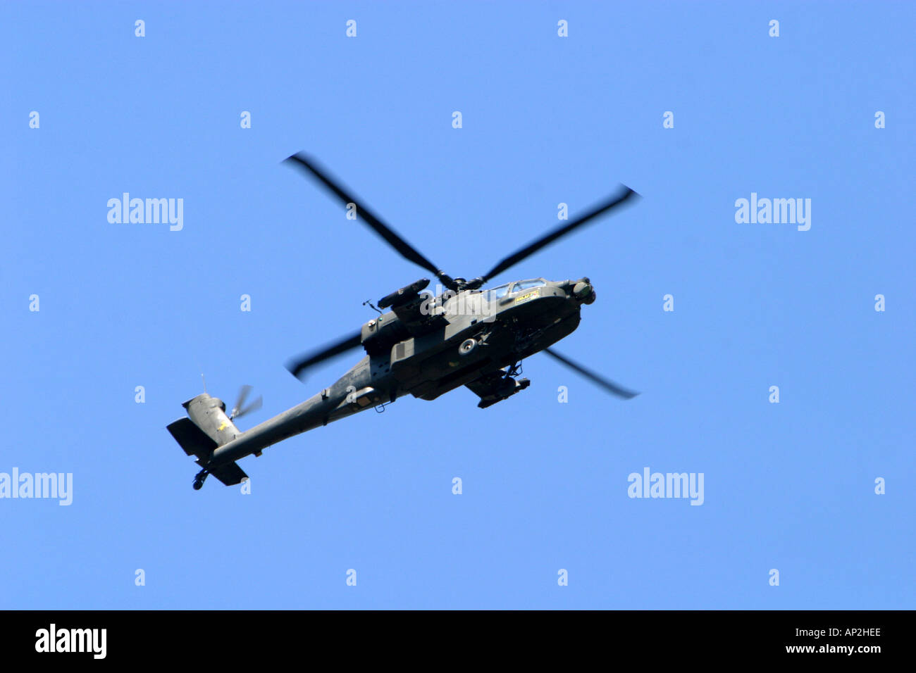 Apache AH64D helicopter performing acrobatics at an air display and ...