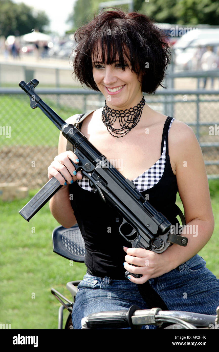A girl with a gun Stock Photo - Alamy