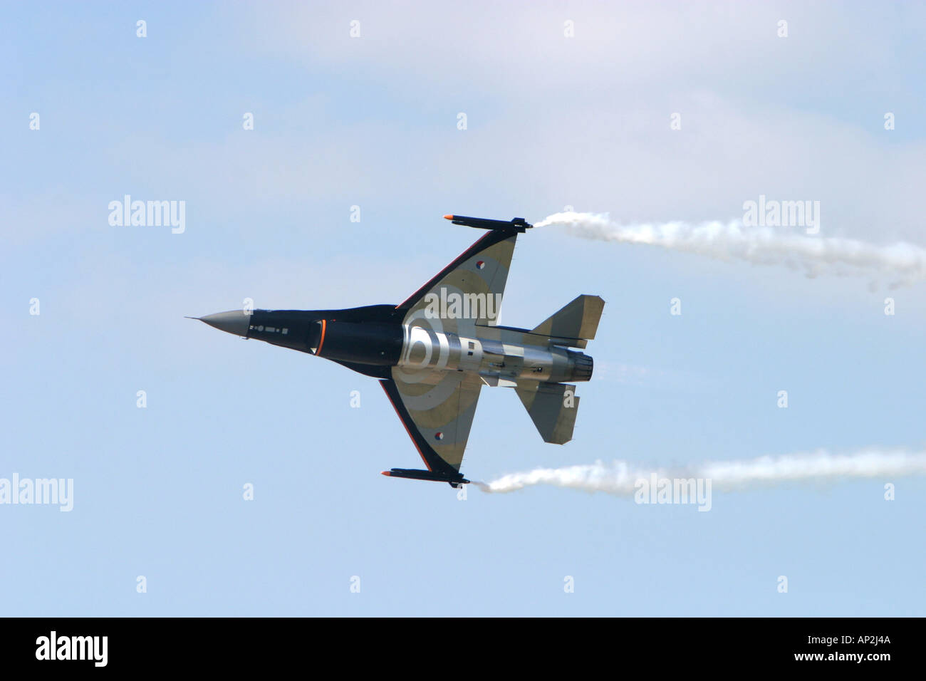 F16 military fighter jet performing an acrobatic display Stock Photo ...