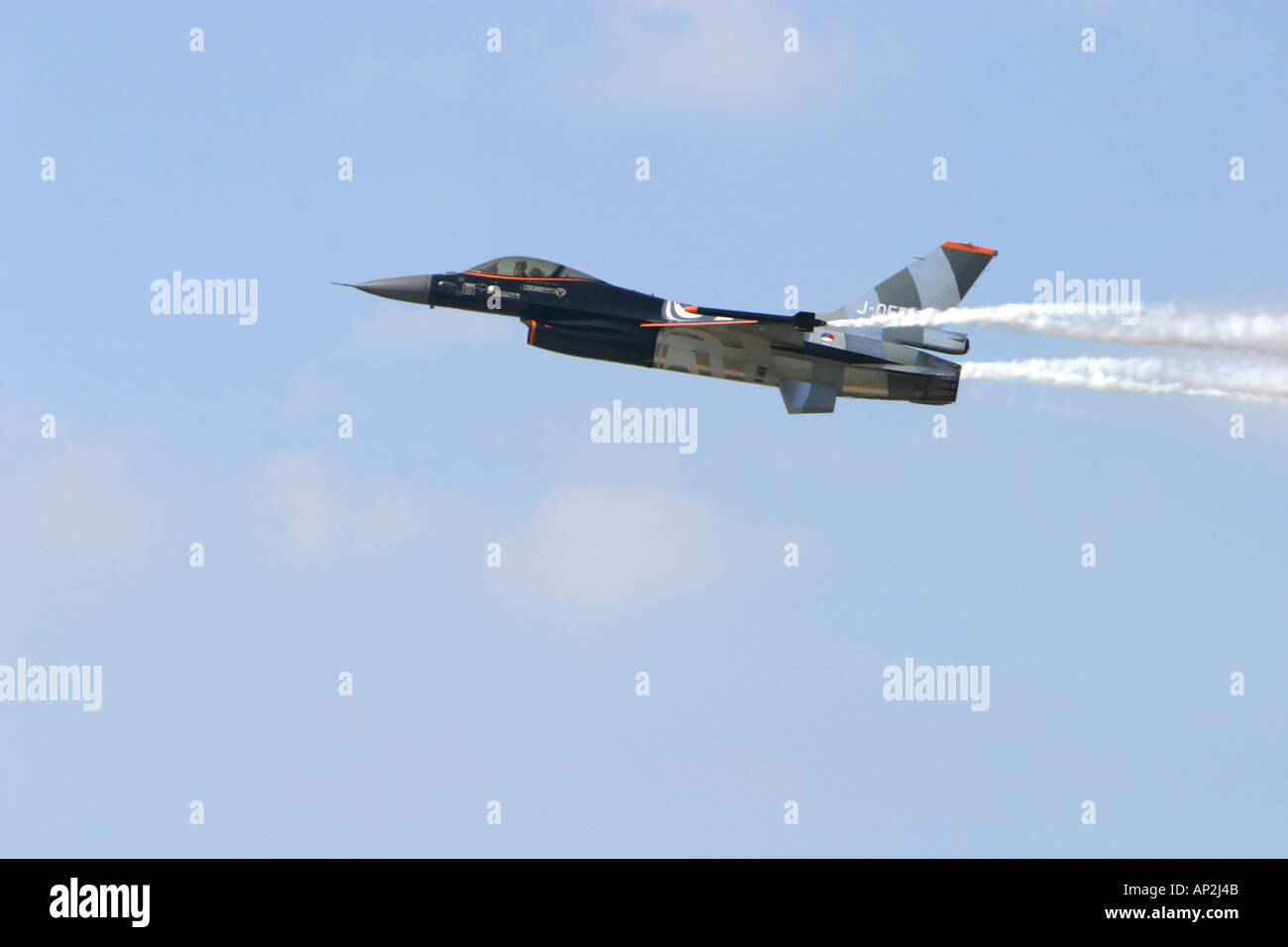 F16 military fighter jet performing an acrobatic display Stock Photo ...