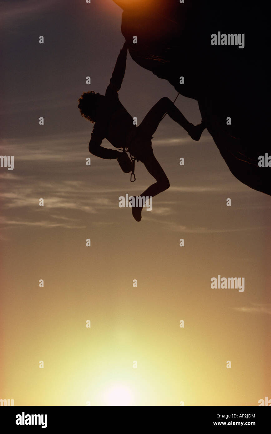 Silhouette of a man free climbing at Mount Arapiles at sunset, Rock ...