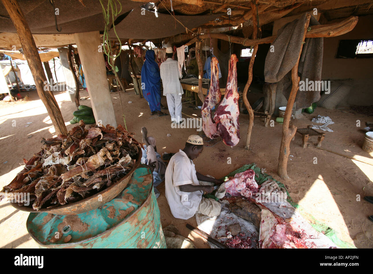 Butcher cutting meat african man hi-res stock photography and images ...