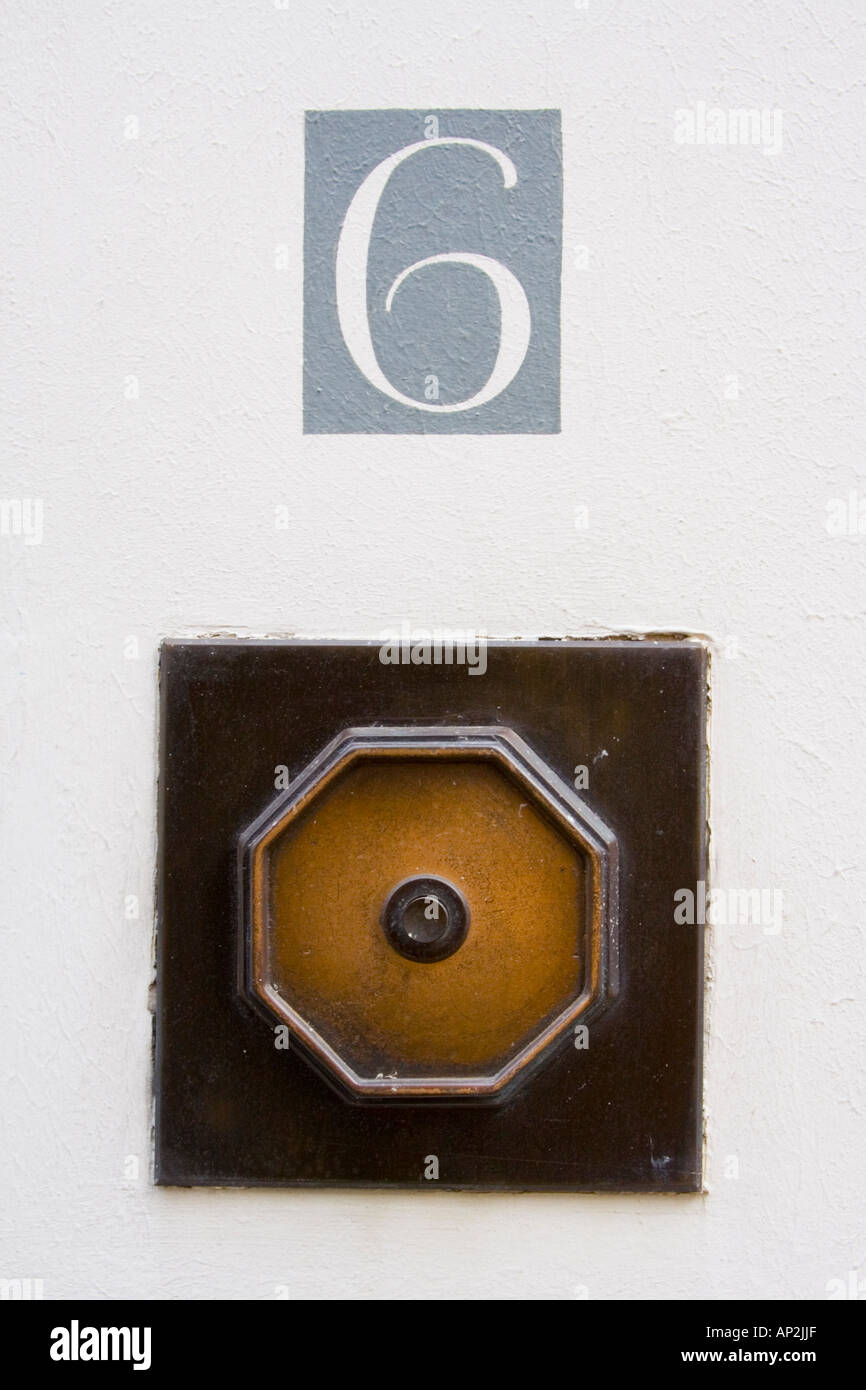 House number sign above doorbell Stock Photo - Alamy
