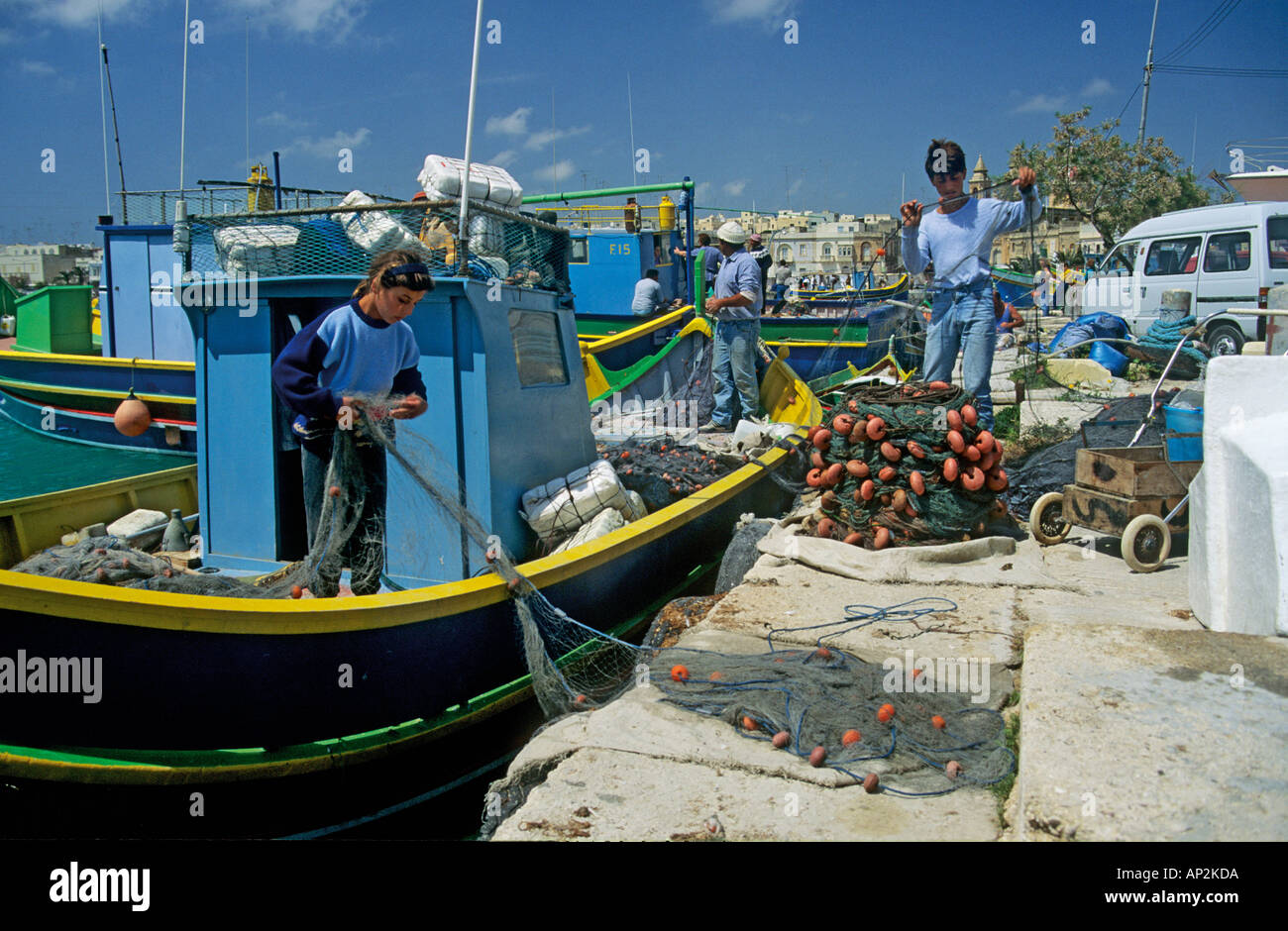 Girl mending nets hi-res stock photography and images - Alamy