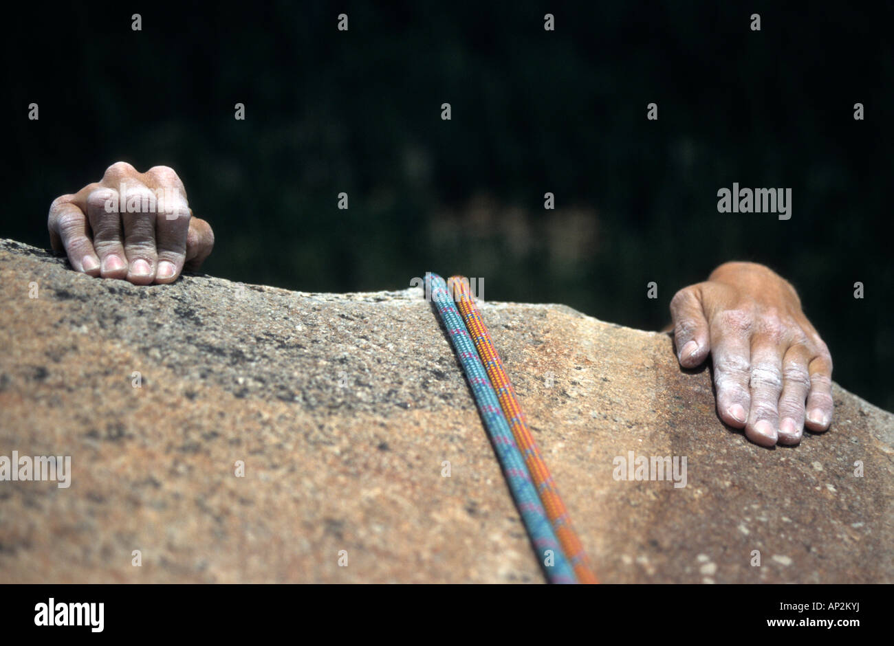 climbers hands and rope at cliff, Yosemite Valley, Yosemite National ...