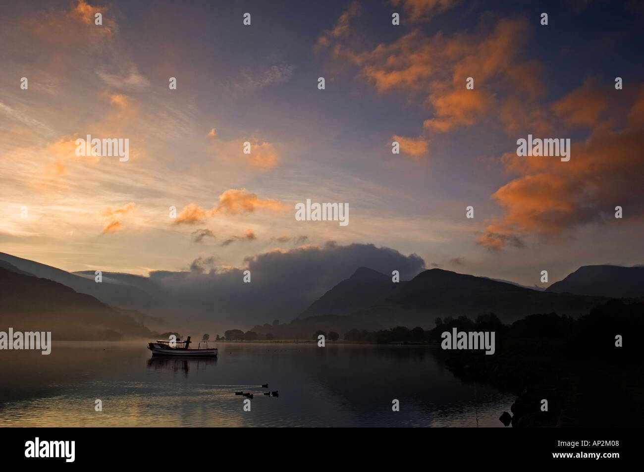 Sunrise over Lake Padarn Llanberis Snowdonia North Wales UK Stock Photo ...