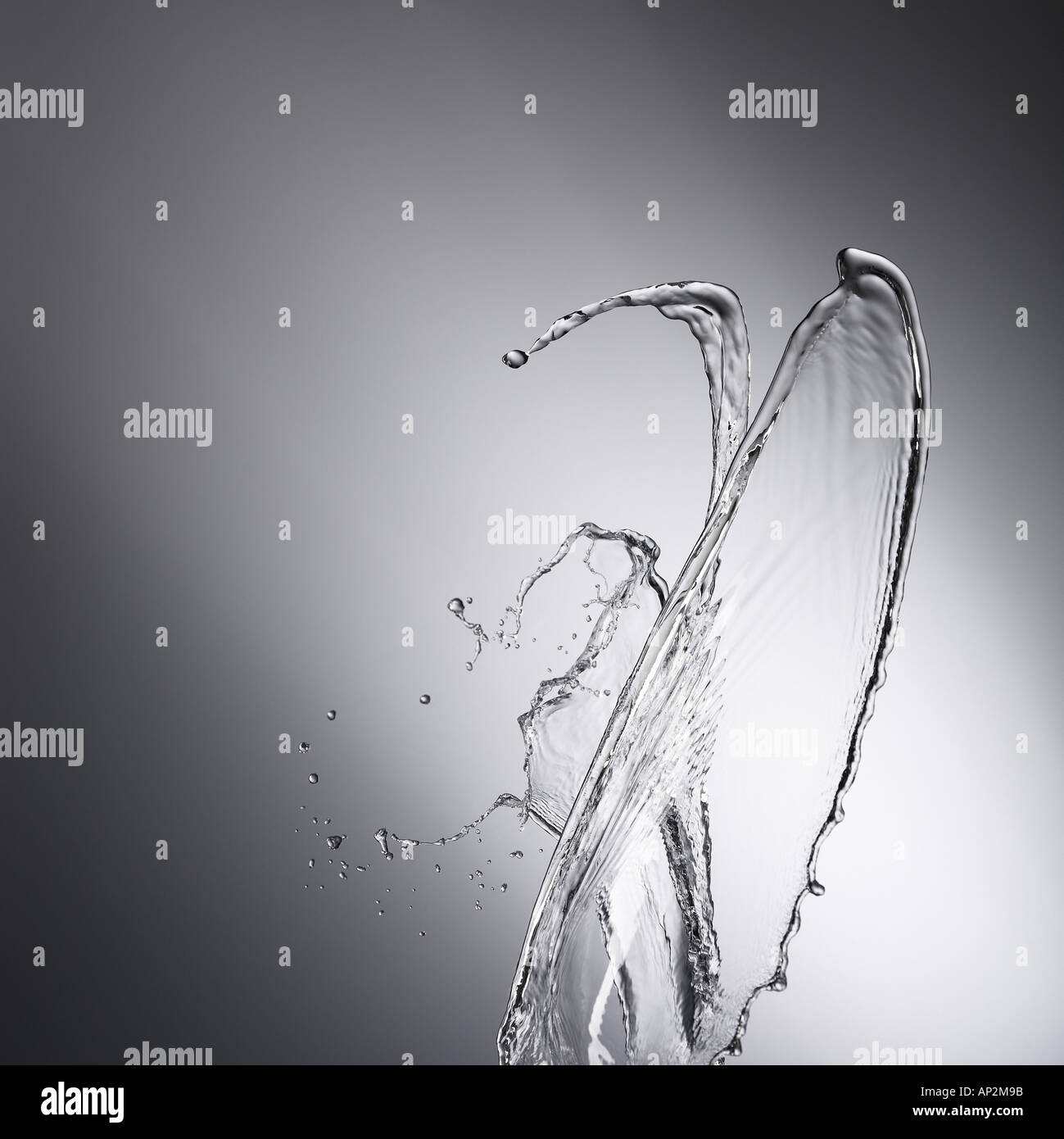 IQP72641 Water drop splash with grey background Stock Photo - Alamy