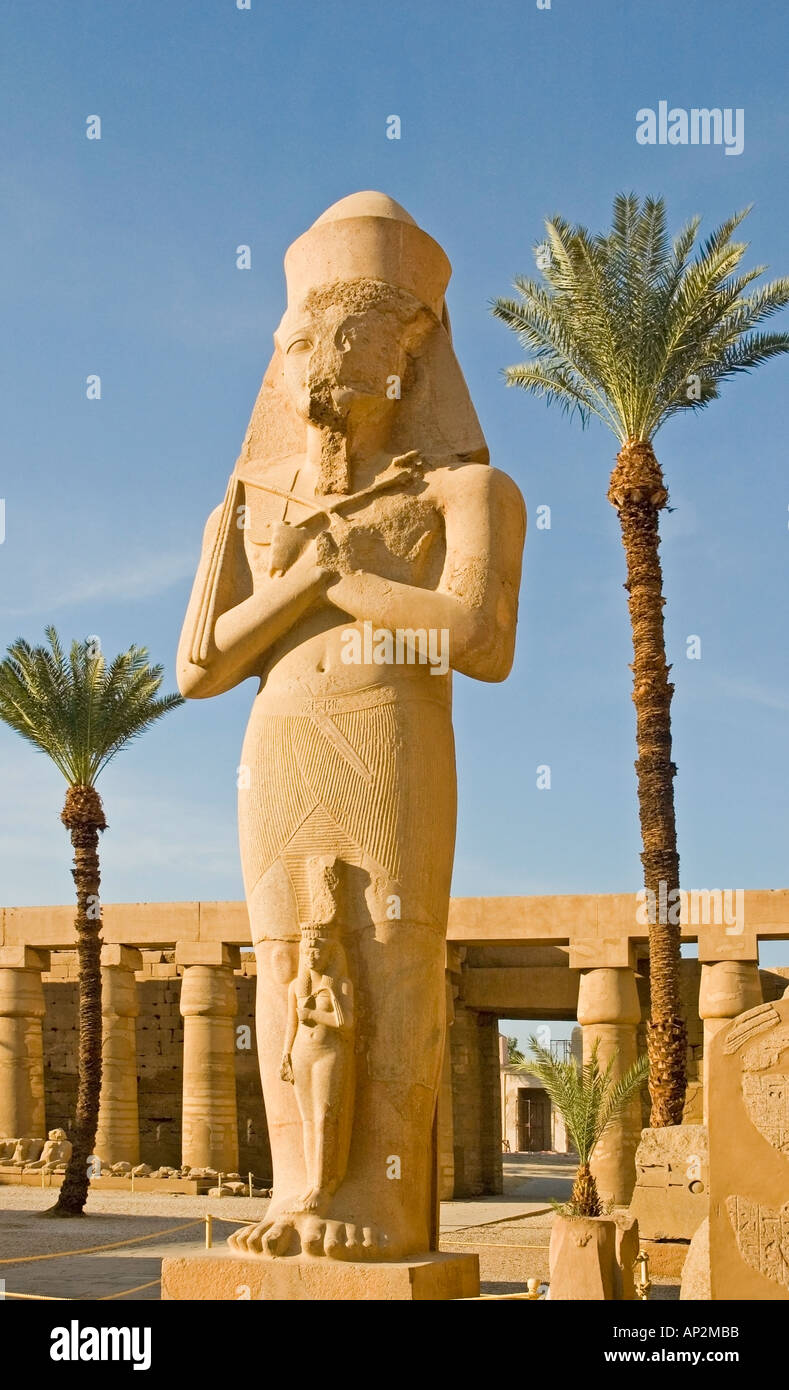Ramses third statue, two palm trees, Karnak Temple Complex, Luxor ...
