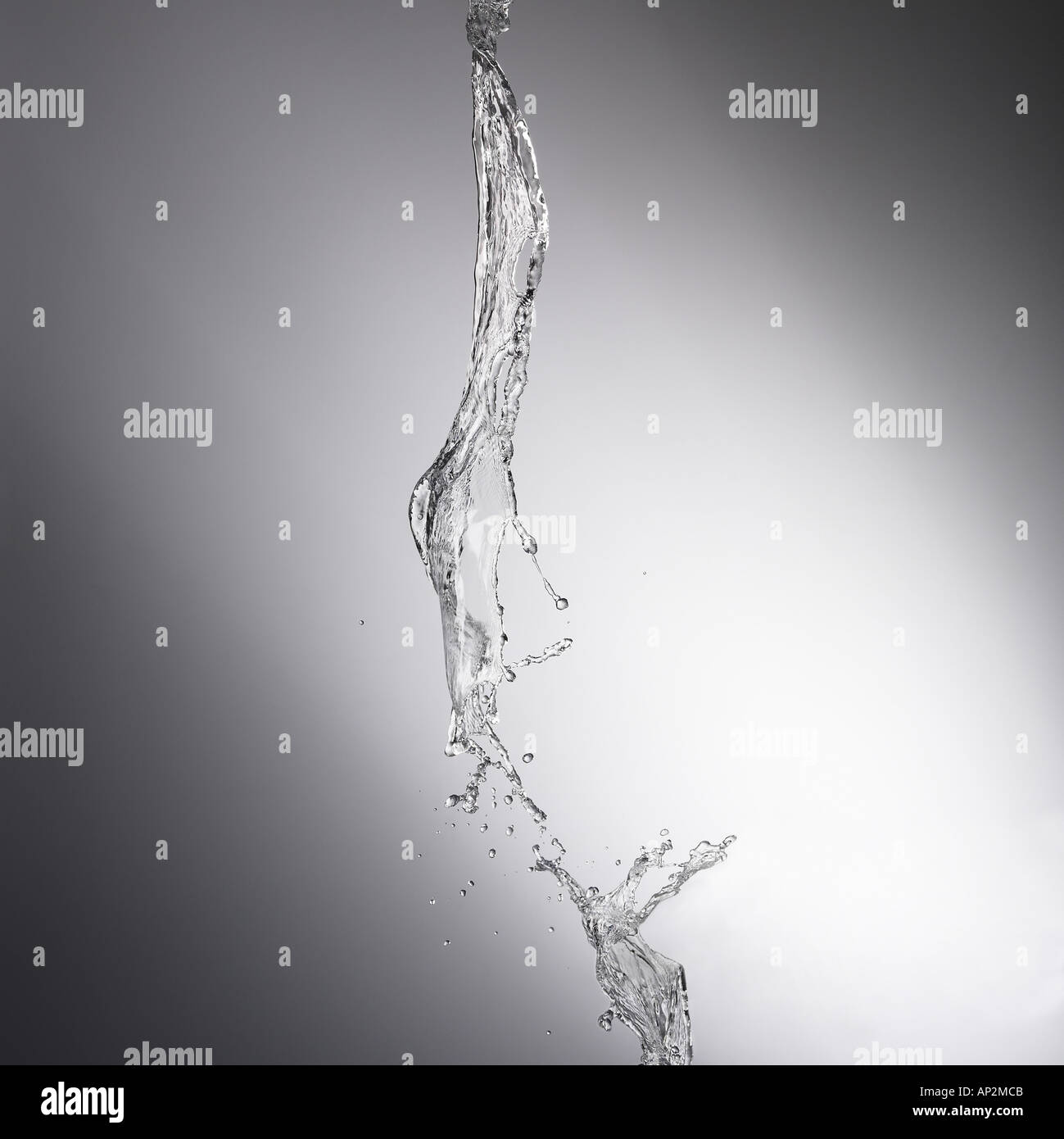 Water drop splash with grey background Stock Photo - Alamy