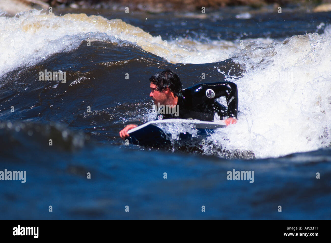 Man bodyboarding Yampa river Steamboat Springs Colorado USA Stock Photo ...