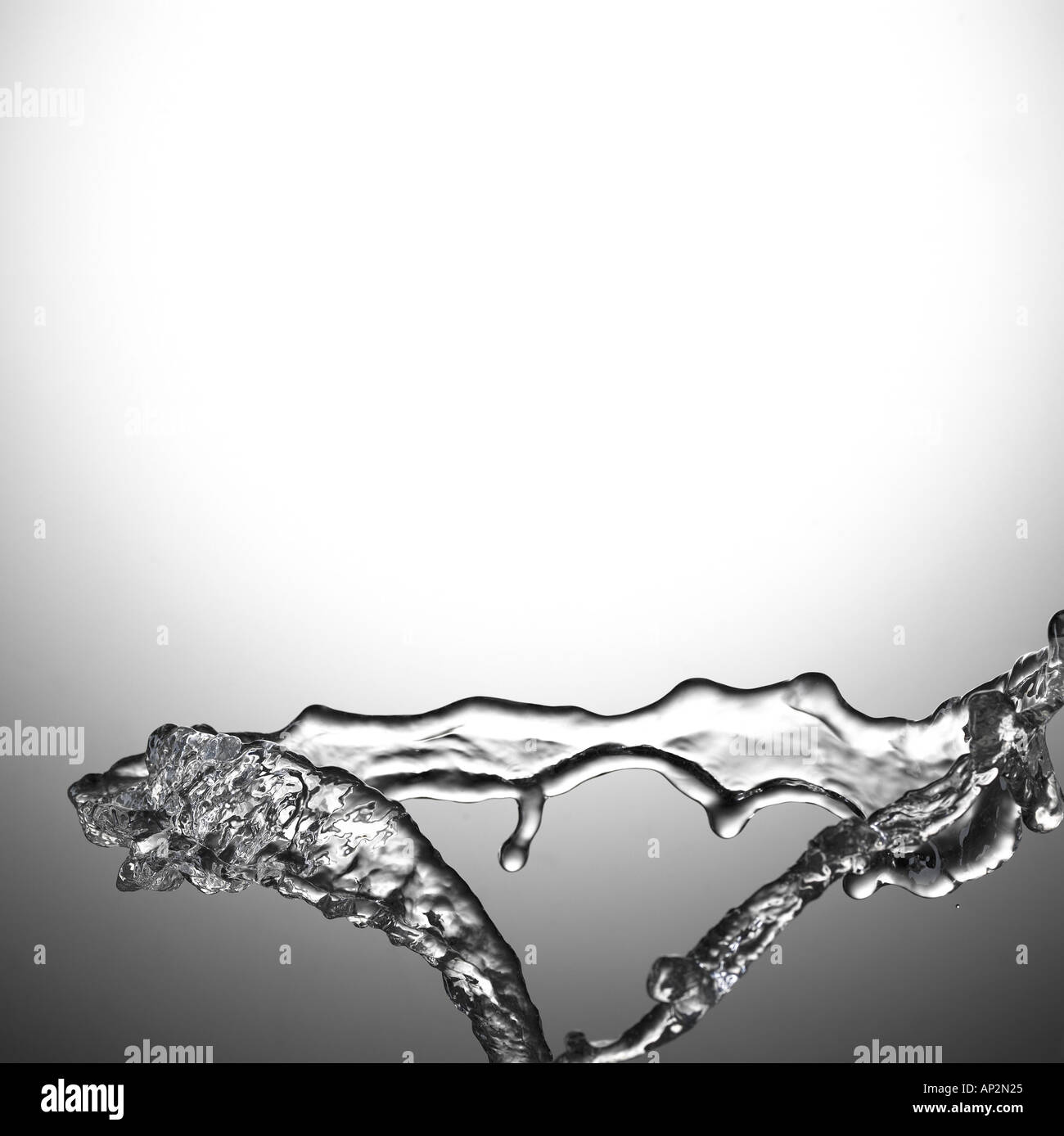 IQP72661 Water drop splash with grey background Stock Photo - Alamy