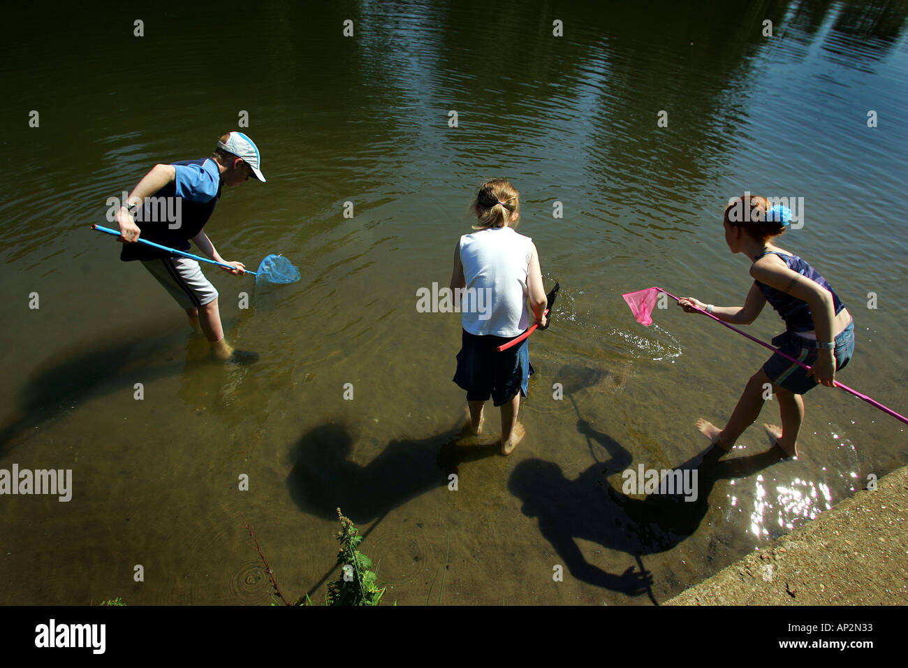 Children fishing in sunshine, River Medway Kent UK Stock Photo - Alamy