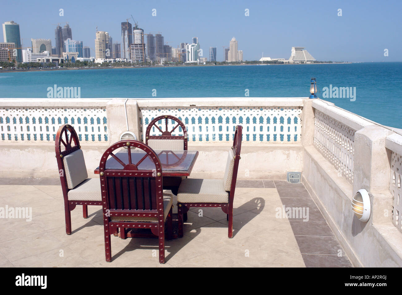 Restaurant at Doha Bay with skyline in the background, Qatar Stock ...