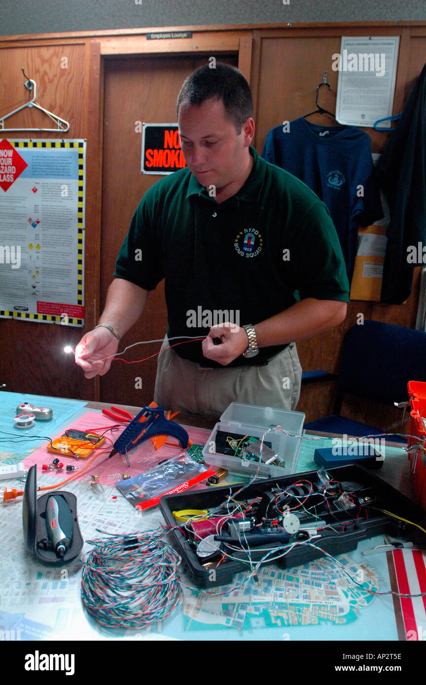 A detective from the NYPD Bomb Squad with materials that might be used ...