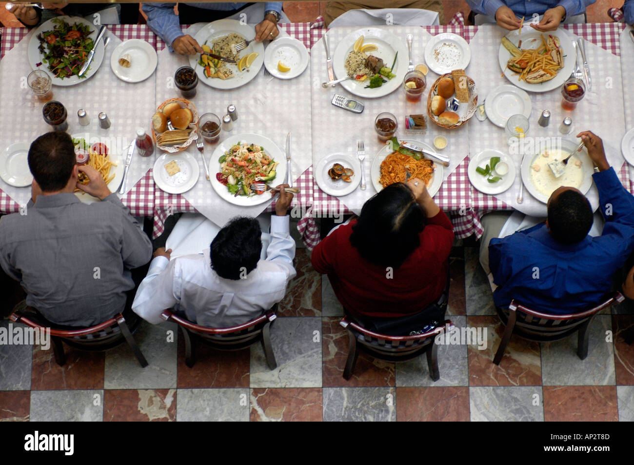 Office workers eat lunch Stock Photo - Alamy