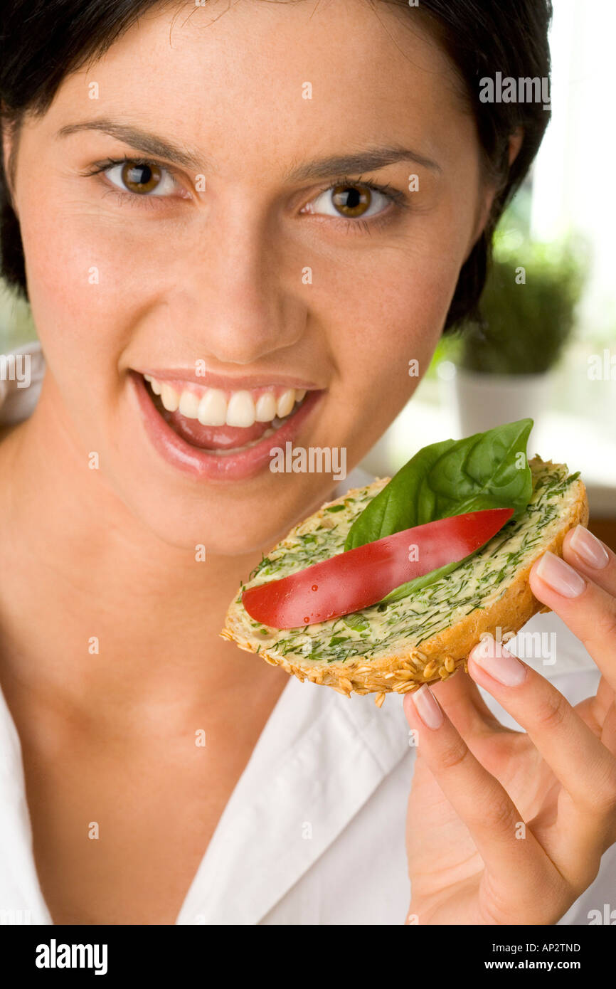 woman eating a sandwich Stock Photo - Alamy