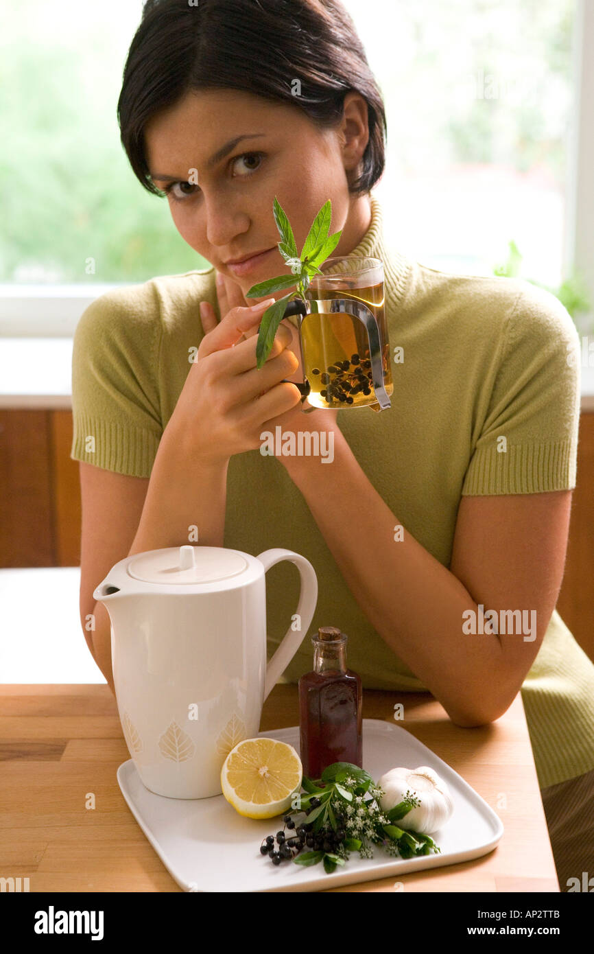 young woman brew up herb Stock Photo - Alamy