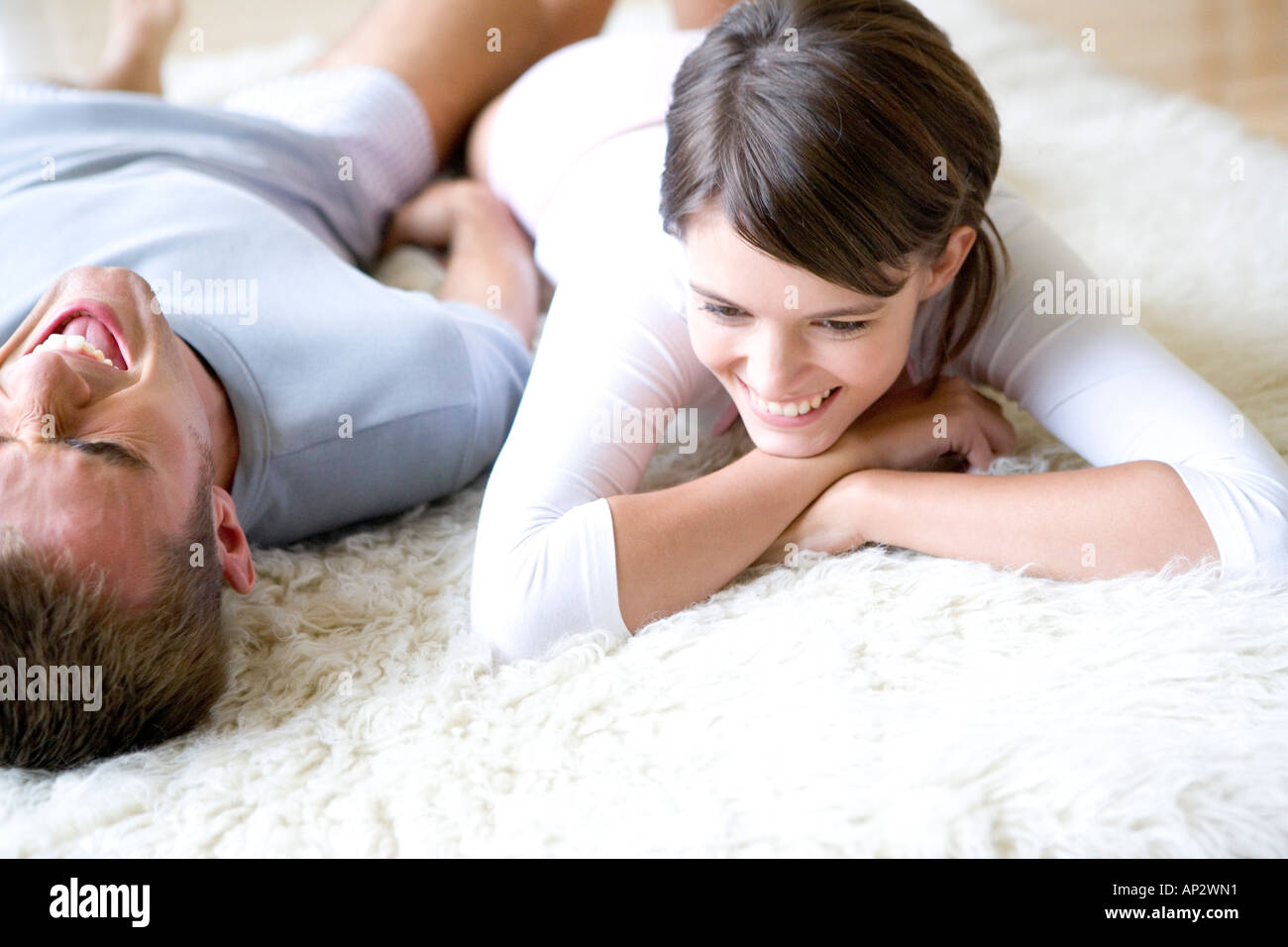 Teenager girl laying on floor hi-res stock photography and images - Alamy