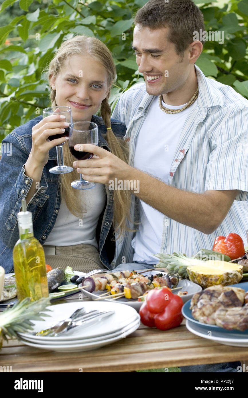 friends having barbecue Stock Photo - Alamy