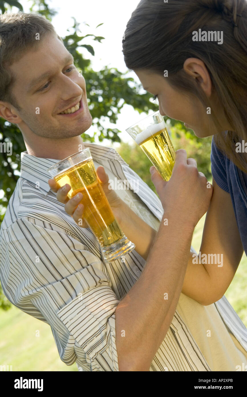 couple drinking beer Stock Photo - Alamy