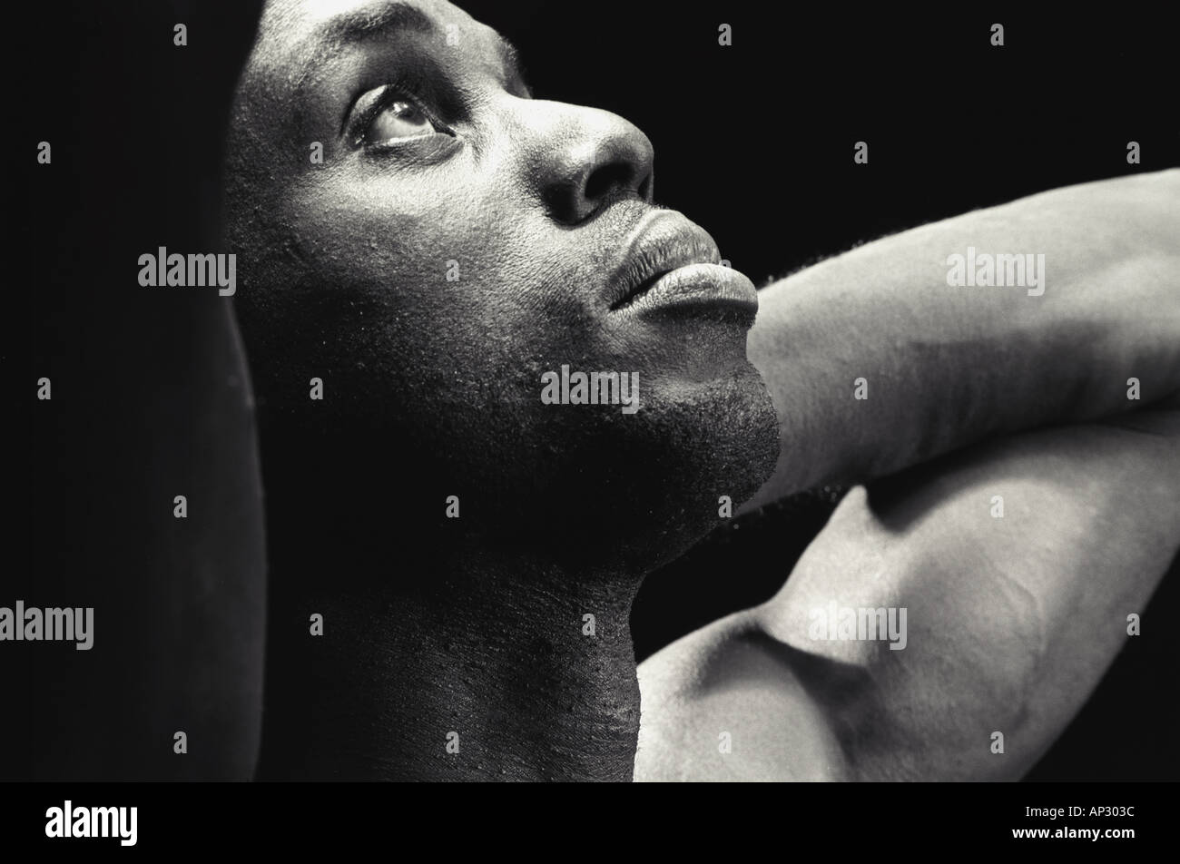 Man looking up Stock Photo - Alamy