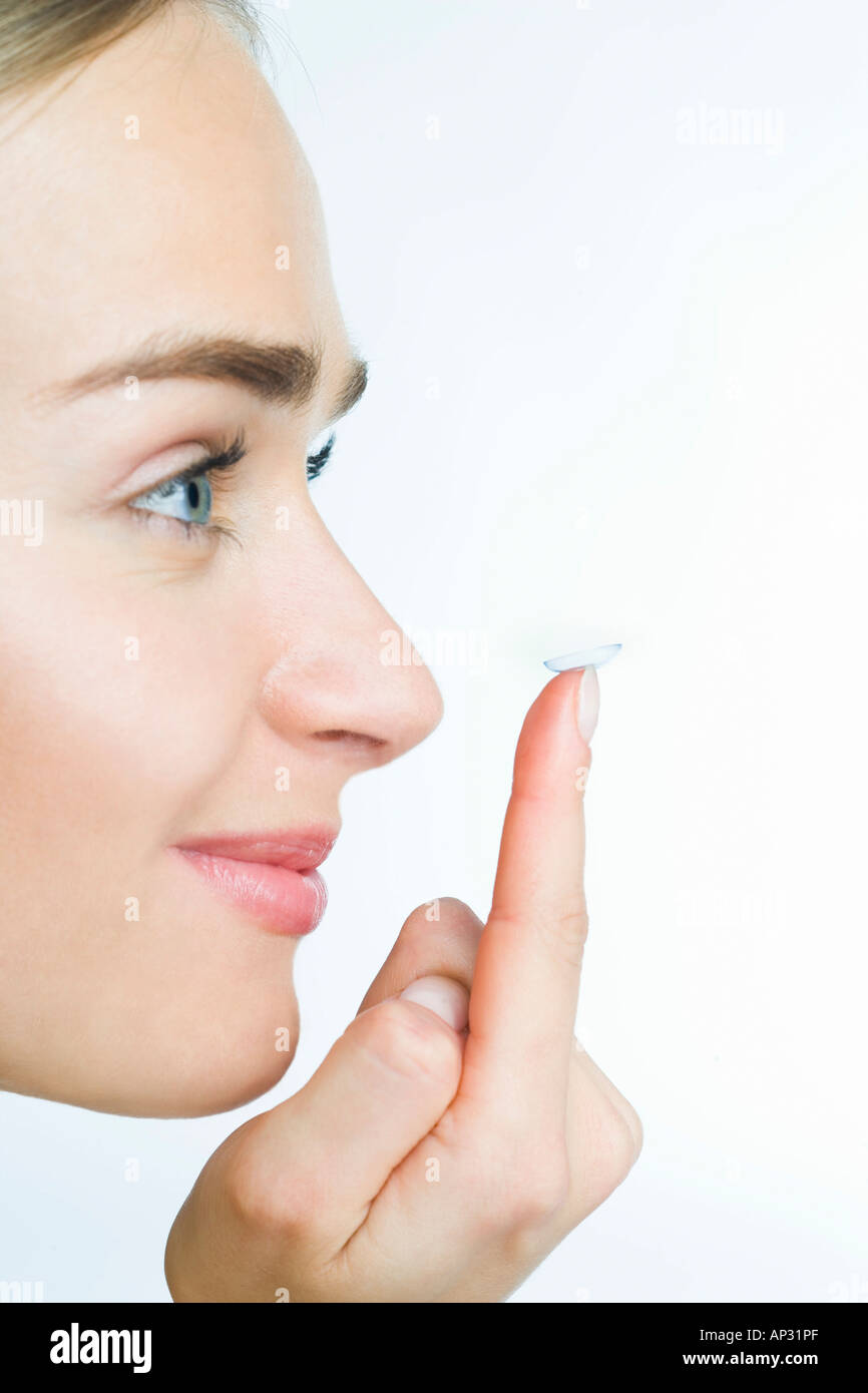 Put on lenses hi-res stock photography and images - Alamy