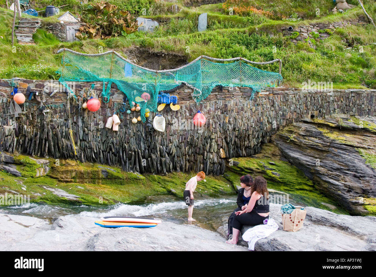 Beach art made from old fishing nets fishing buoys and plastic ...