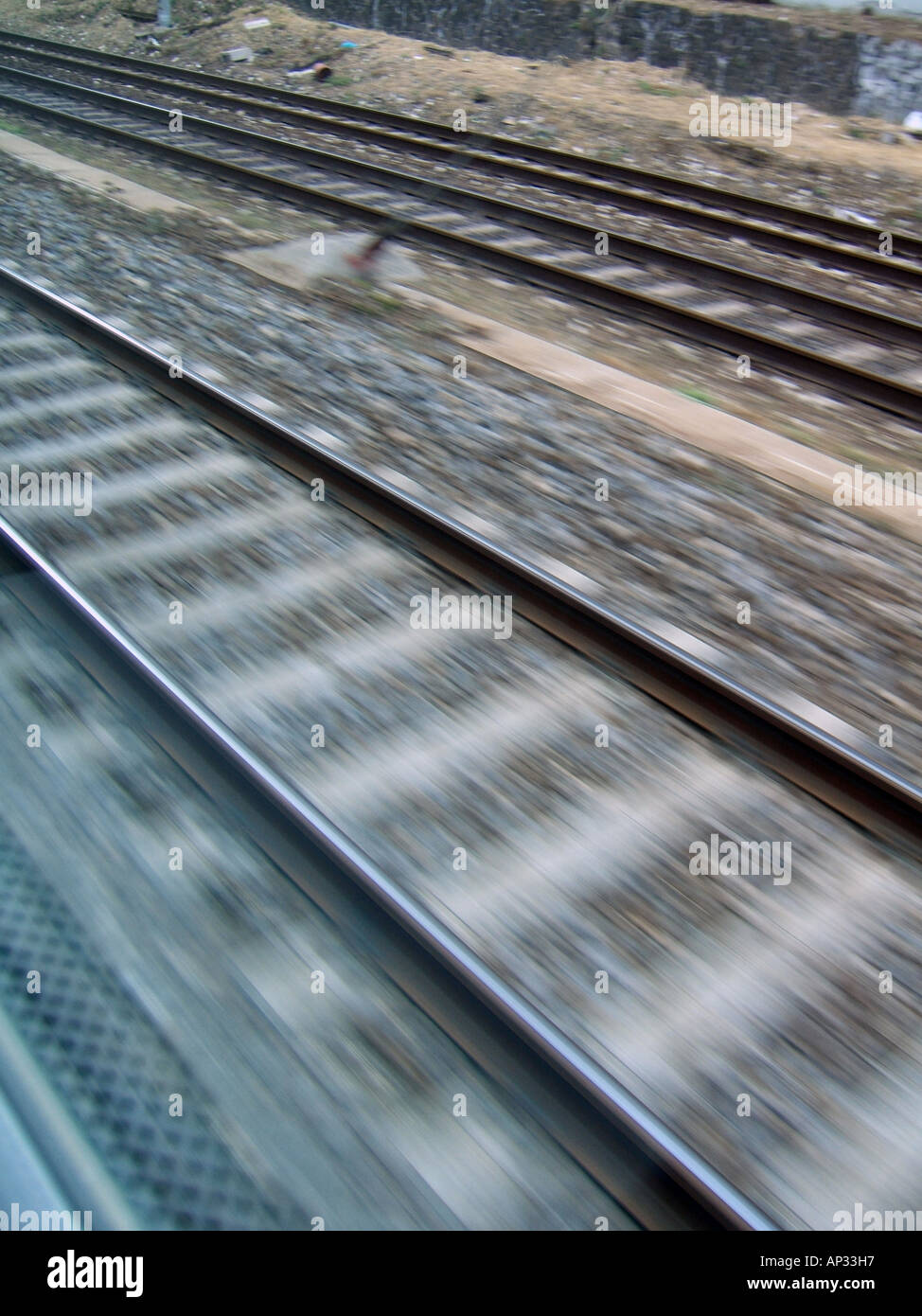 view of train tracks sleepers from fast train window Stock Photo - Alamy