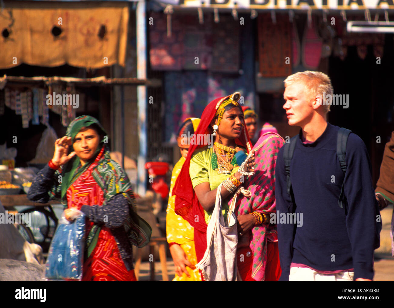 Female Indian hawkers and blonde male western tourist, Jaisalmer ...