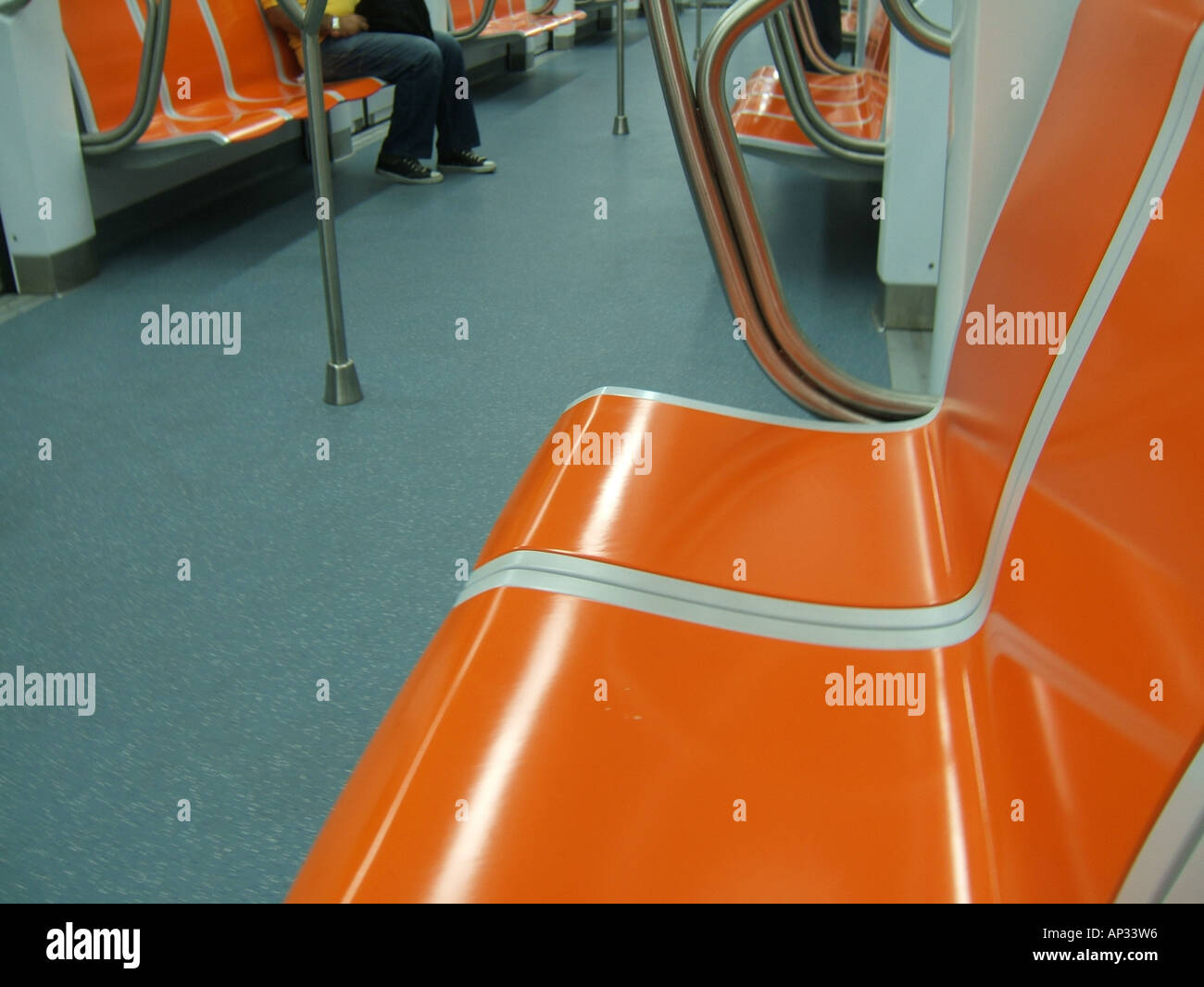 one person sitting on tube train Stock Photo - Alamy