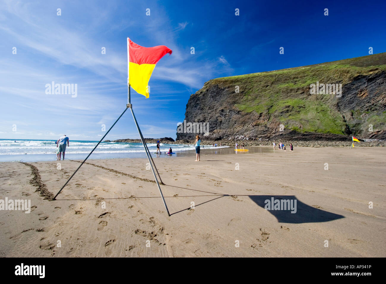 Lifeguard s safety flag blowing in the wind on the beach at Crackington ...