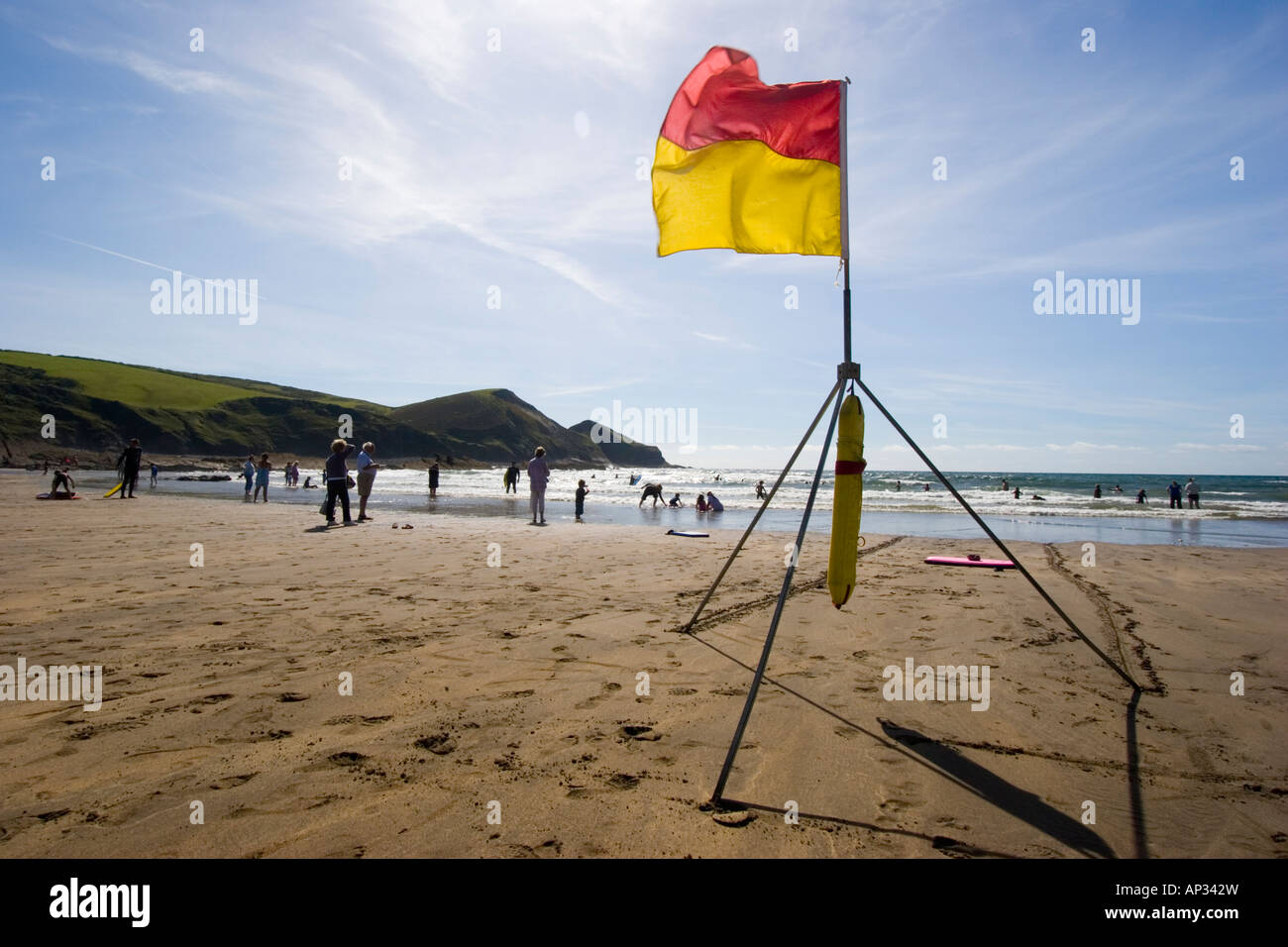 Lifeguard s safety flag blowing in the wind on the beach at Crackington ...