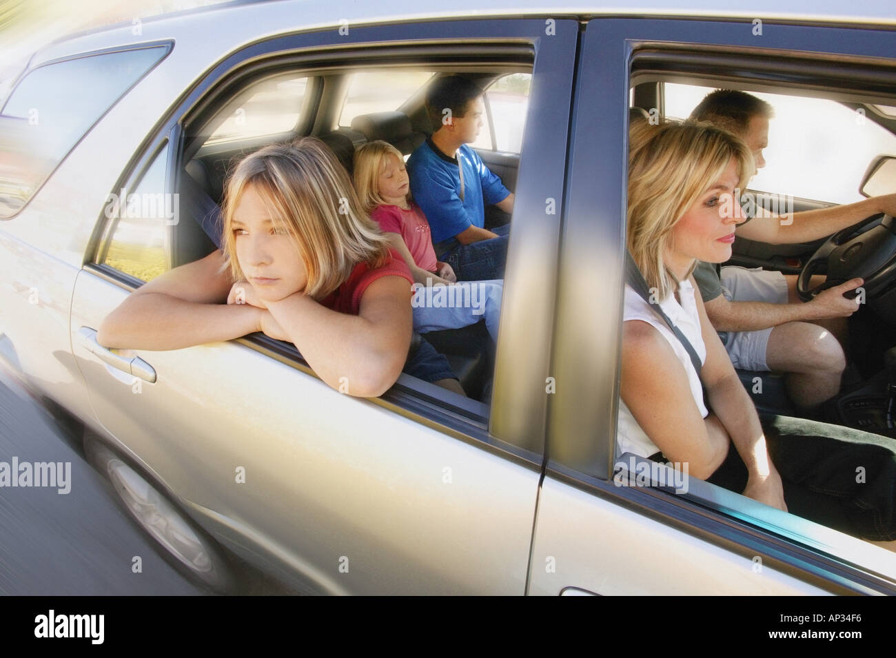 Family in a car Stock Photo - Alamy